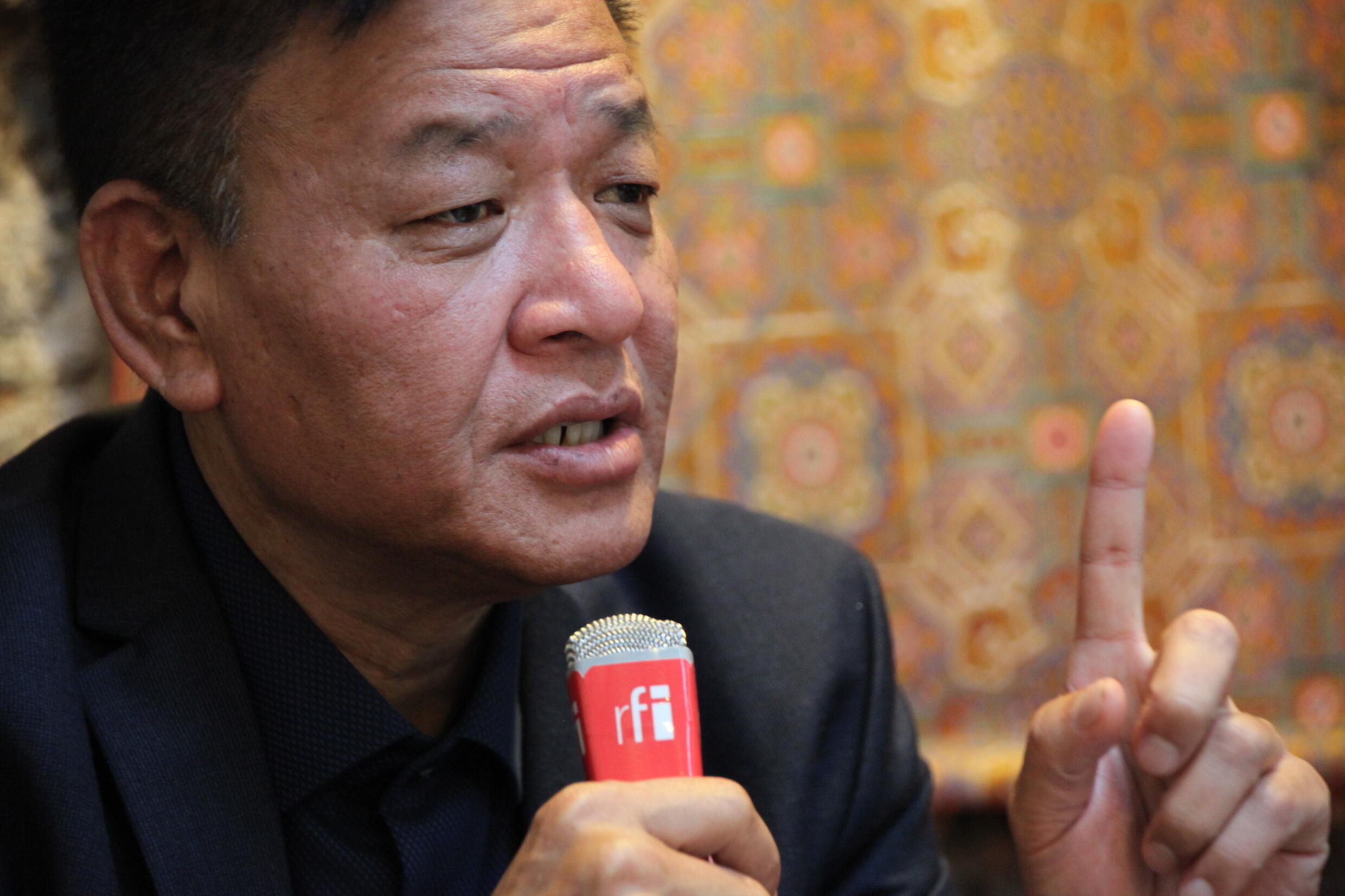 Leader of Tibetan government in exile warns France over China's policies